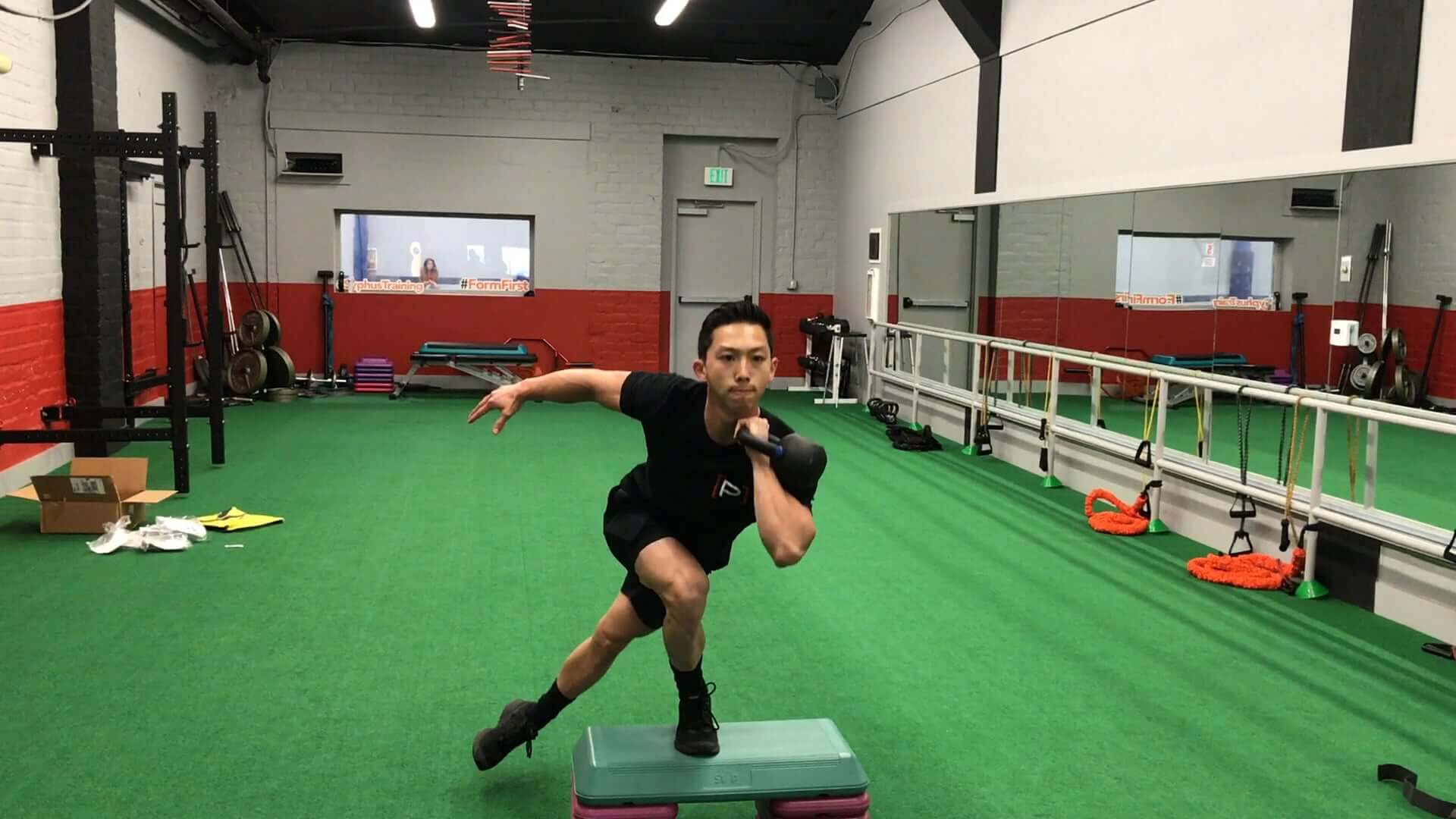 Curtsey Step Down with Contralateral Kettlebell Rack Hold - [P]rehab