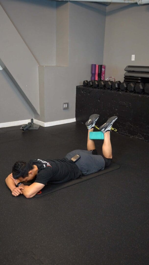 Prone Hamstring Curl - Block - [P]rehab
