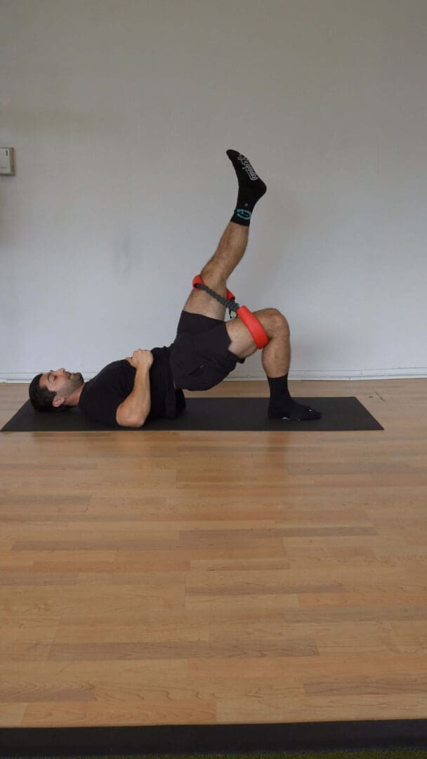 Straight Leg Bridge to Single Leg Bridge - Band - [P]rehab