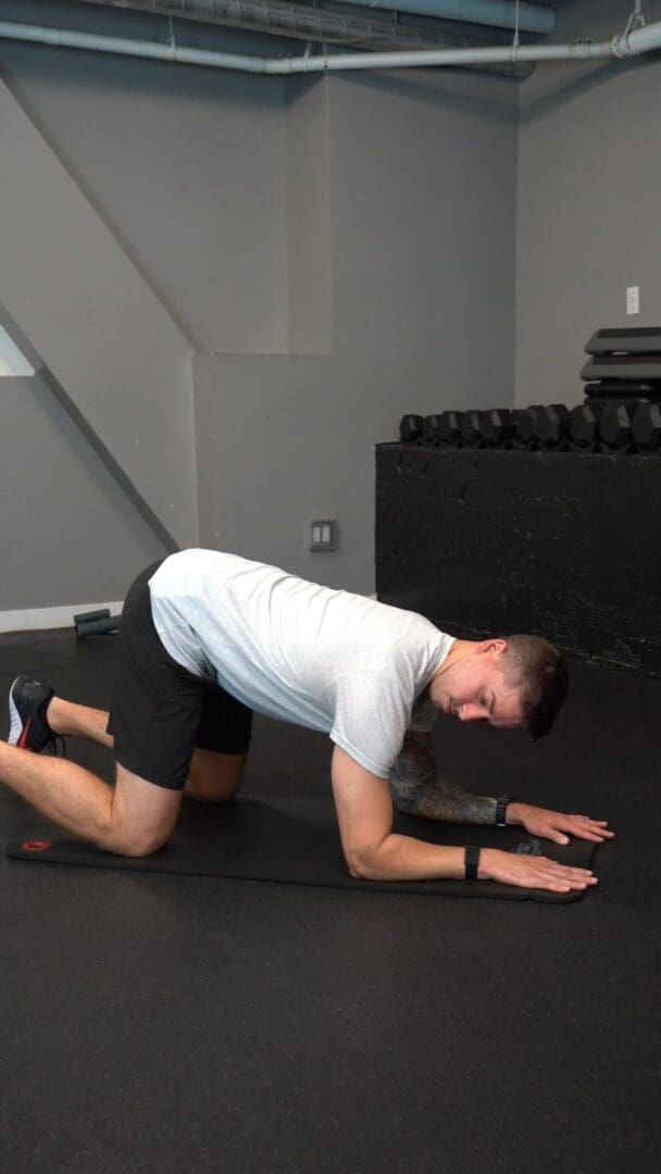 Quadruped Neck Rotation - On Forearms, Chin Tuck - [P]rehab