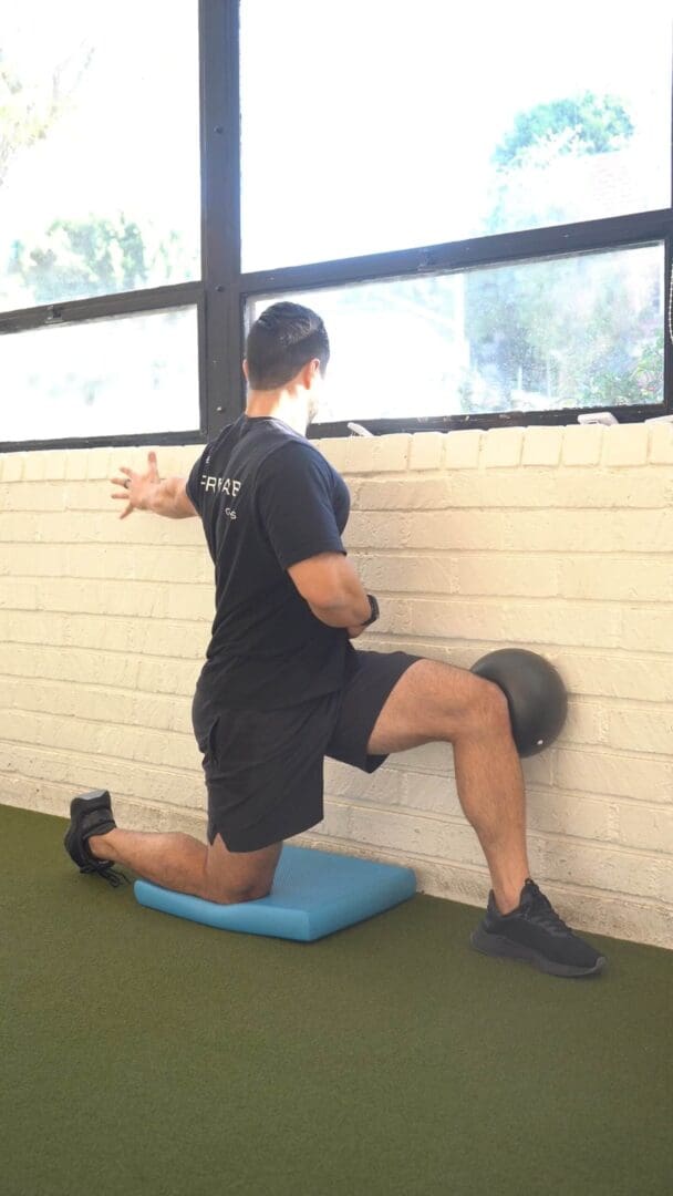 Half Kneeling Thoracic Windmill - Closed, Ball - [P]rehab