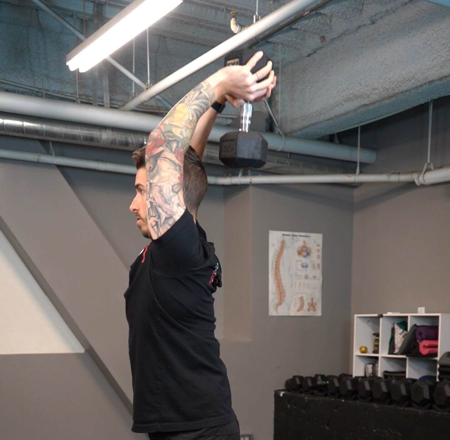 Standing Overhead Tricep Extension - Dumbbell - [P]rehab