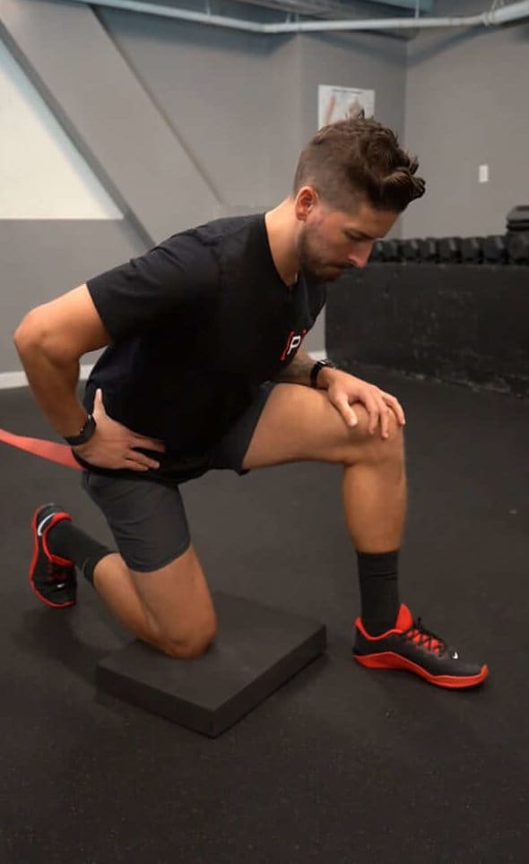 Half Kneeling Posterior Hip Mobilization - Band - [P]rehab